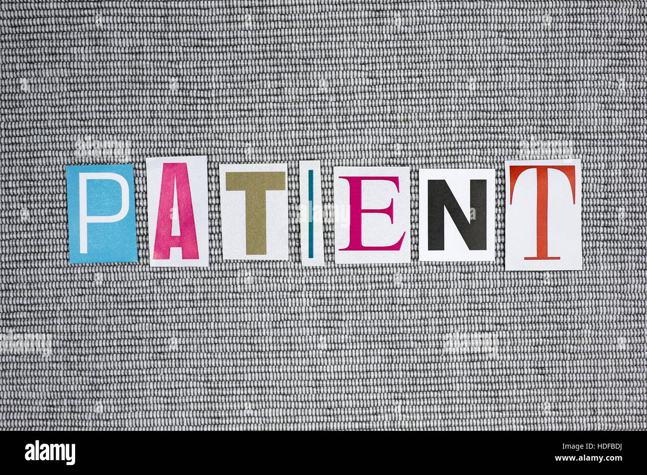patient word on grey background Stock Photo - Alamy