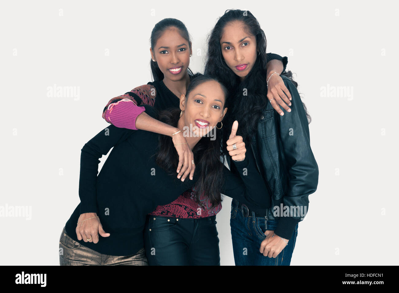 Beautiful sisters doing different expressions in different sets of ...