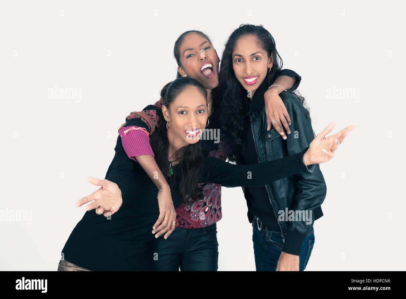Beautiful sisters doing different expressions in different sets of ...