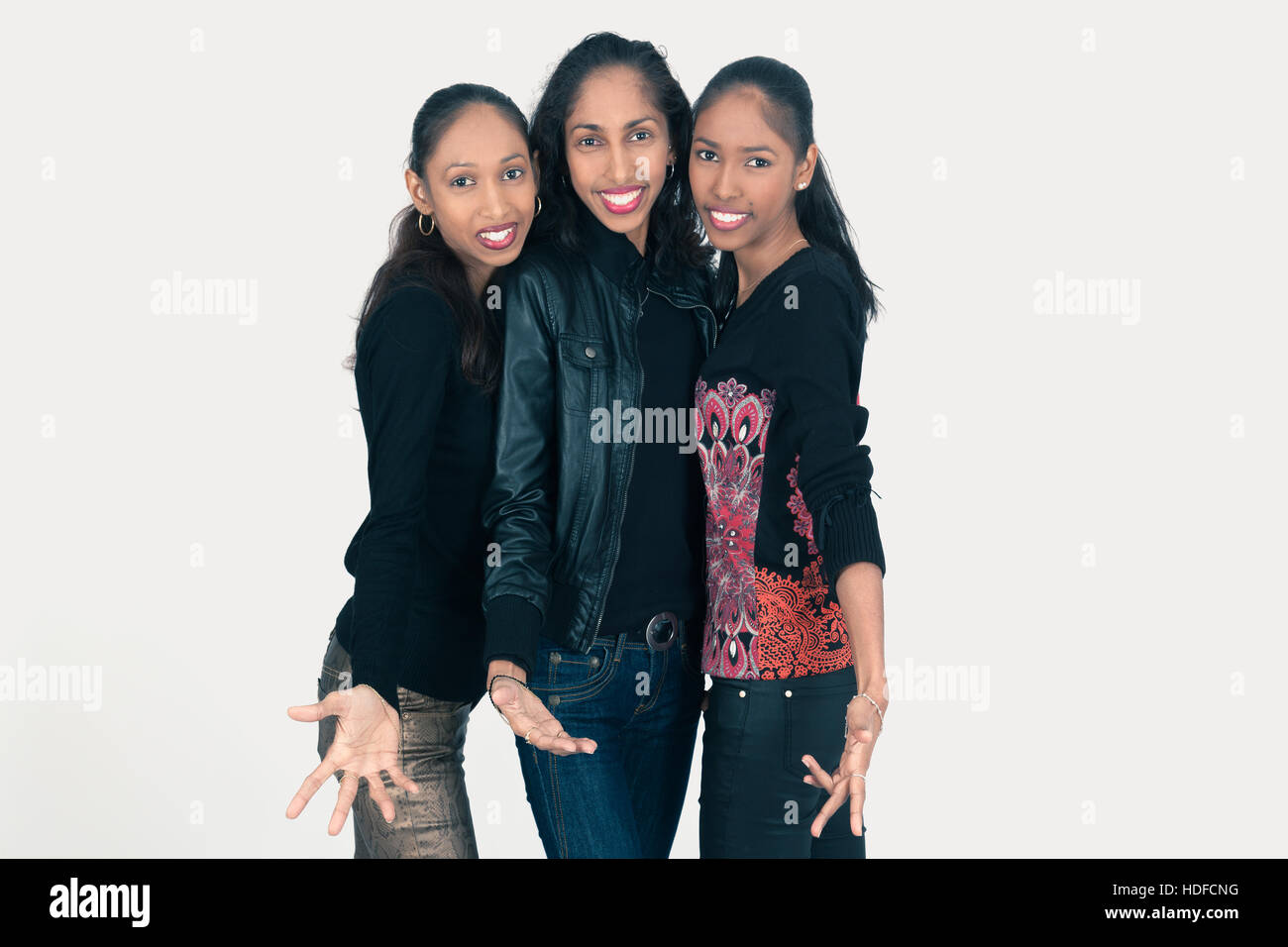 Beautiful sisters doing different expressions in different sets of ...