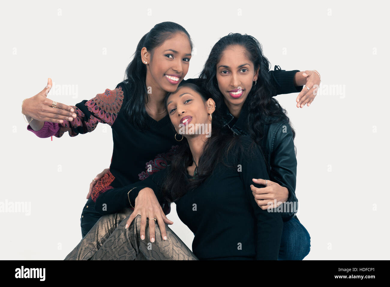 Beautiful sisters doing different expressions in different sets of ...