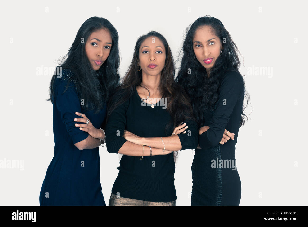 Beautiful sisters doing different expressions in different sets of ...