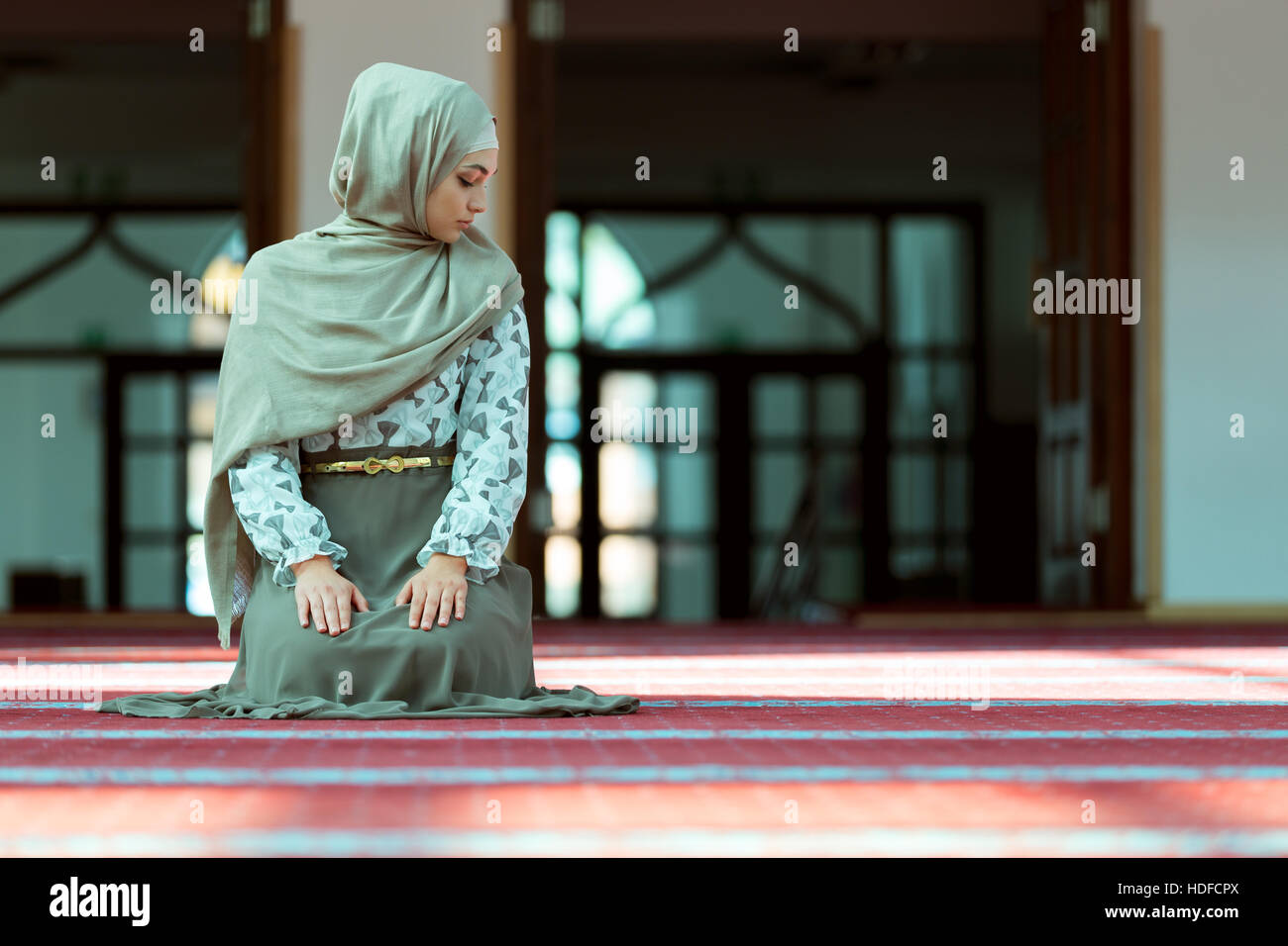 Young beautiful Muslim Woman Praying In Mosque Stock Photo - Alamy