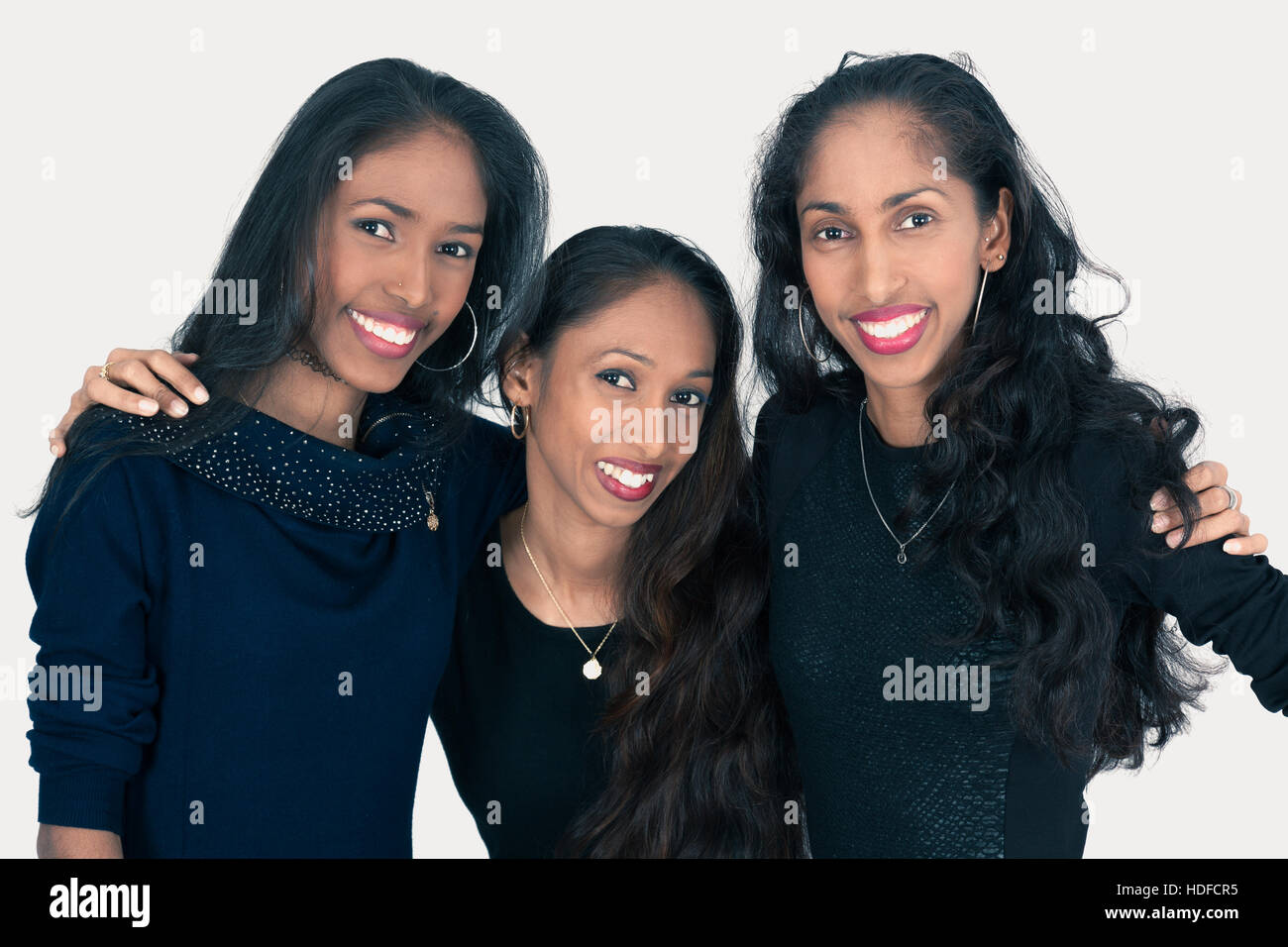 Beautiful sisters doing different expressions in different sets of ...