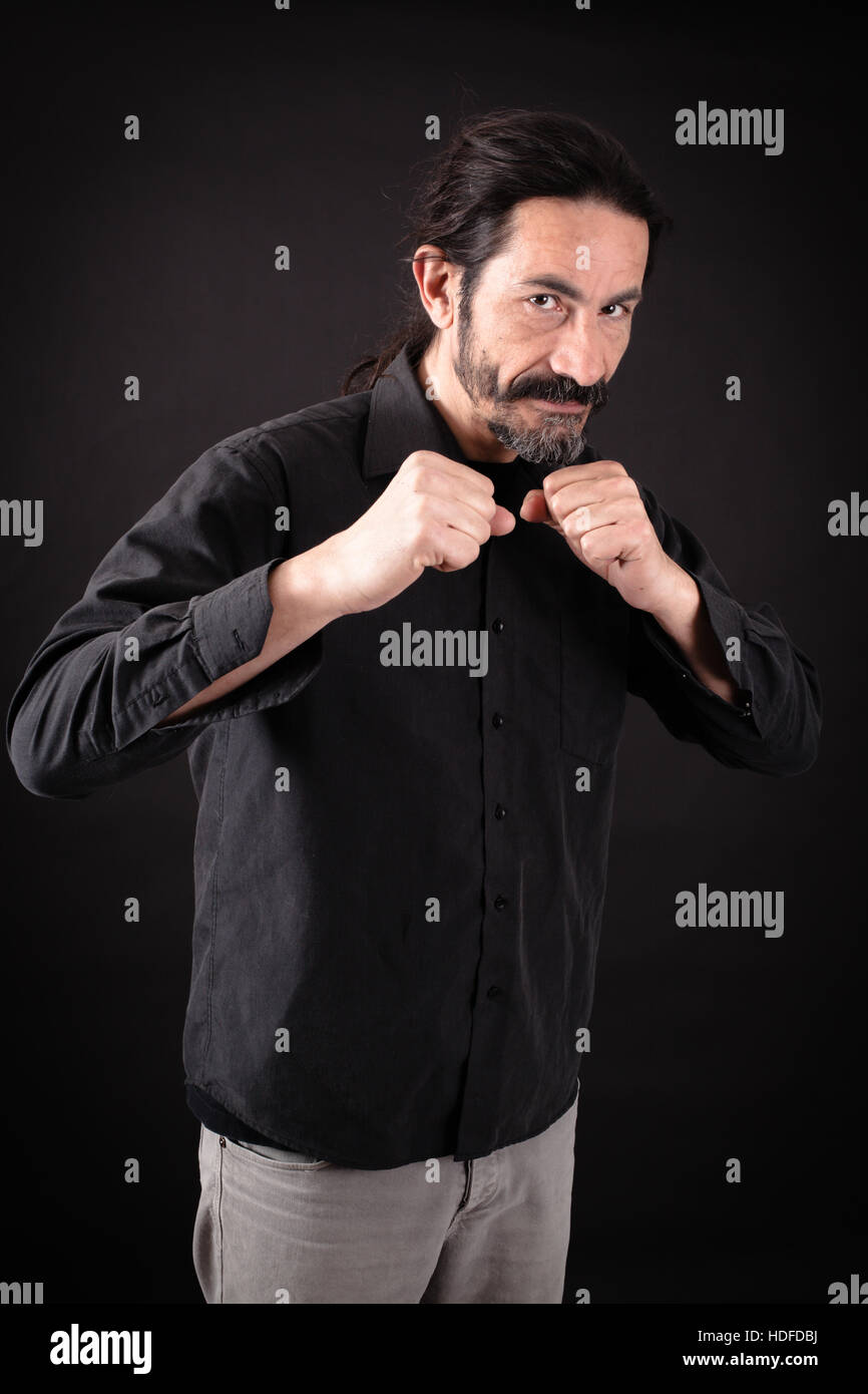 Handsome man doing different expressions in different sets of clothes ...