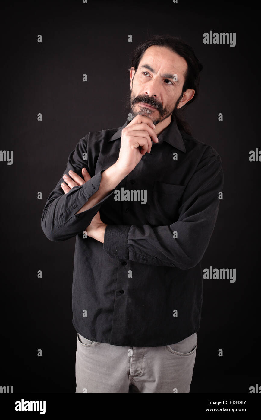 Handsome man doing different expressions in different sets of clothes ...