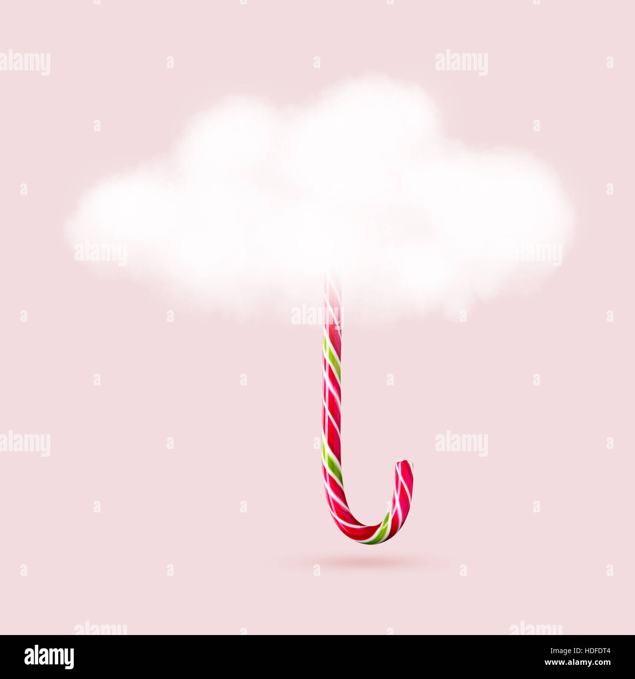 clouds and long Christmas candy on a pink background Stock Photo - Alamy
