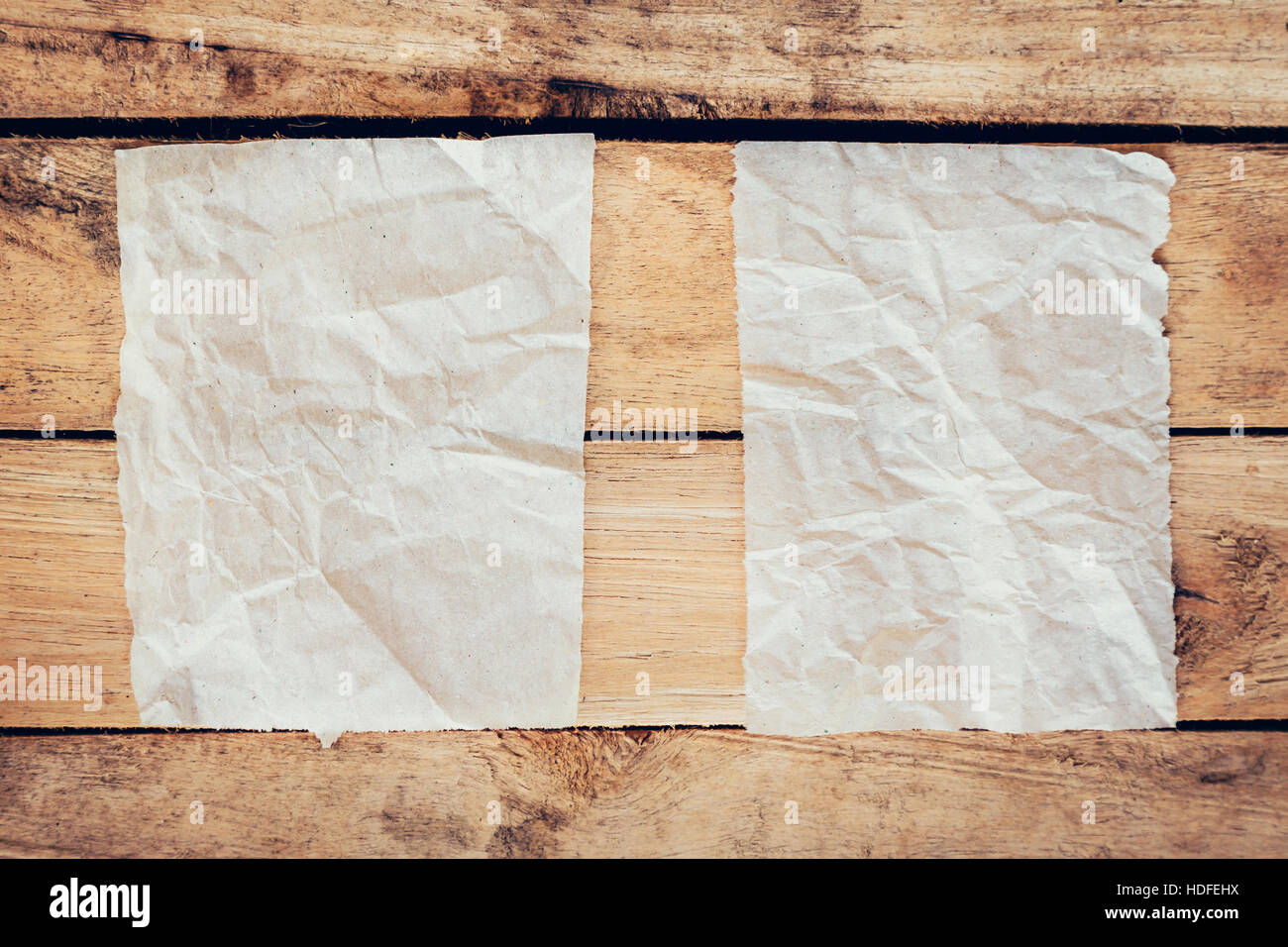 Old torn paper and poster vintage on wood background with space Stock ...