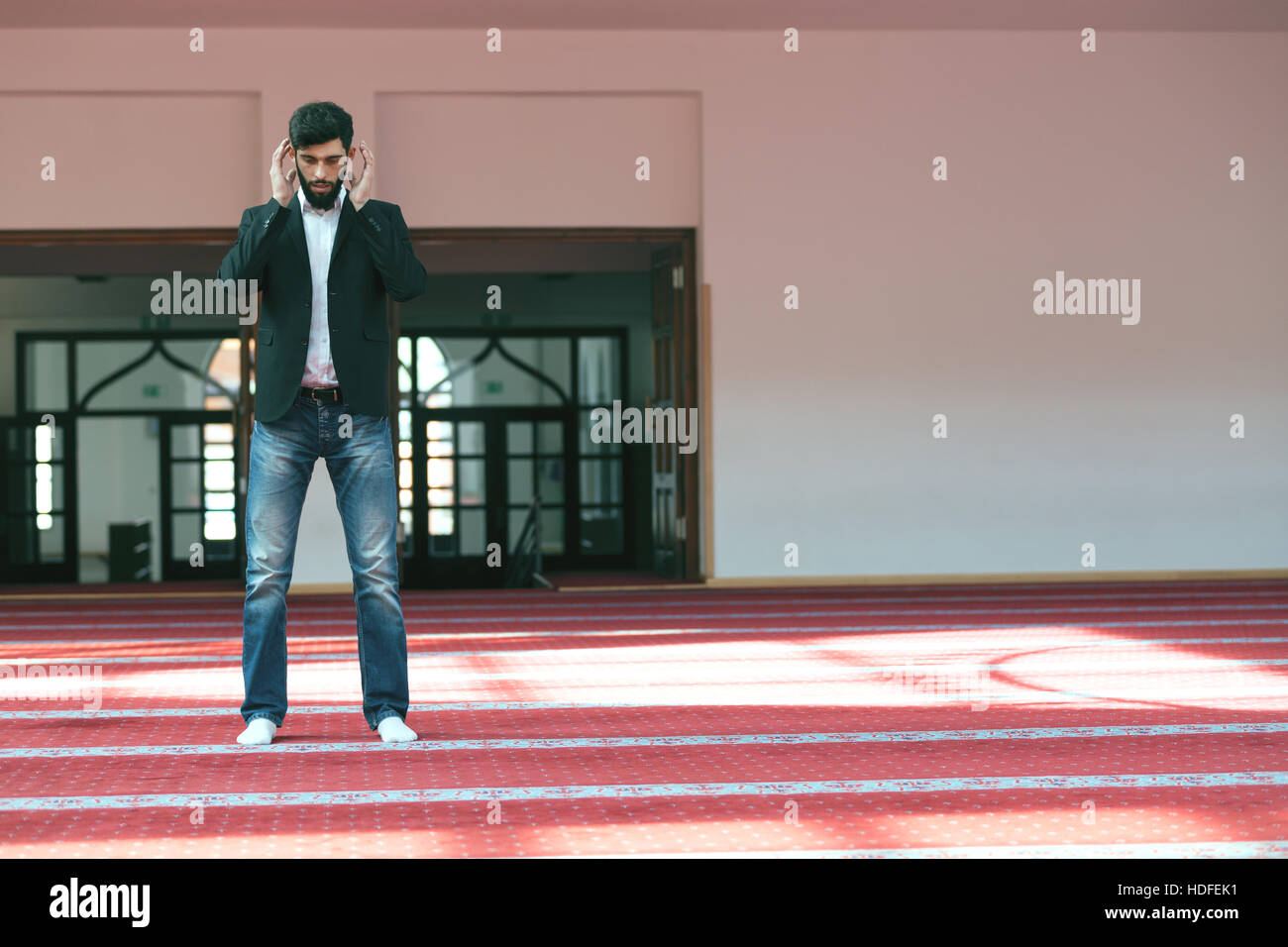 Young beautiful Muslim Man Praying In Mosque Stock Photo - Alamy