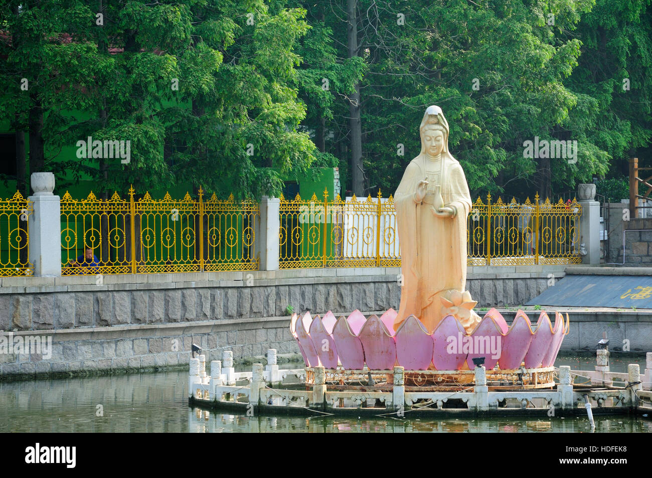 The goddess of mercy guanyin buddha statue over water at Zhanshan ...