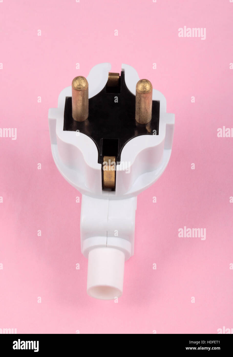 european Outlet Plug on pink background Stock Photo - Alamy