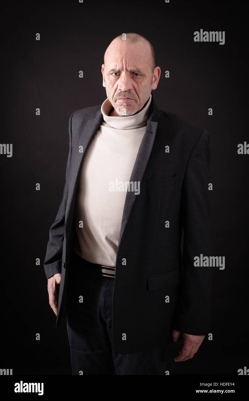 Handsome man doing different expressions in different sets of clothes ...