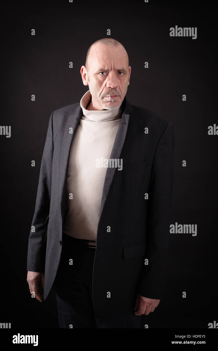 Handsome man doing different expressions in different sets of clothes ...