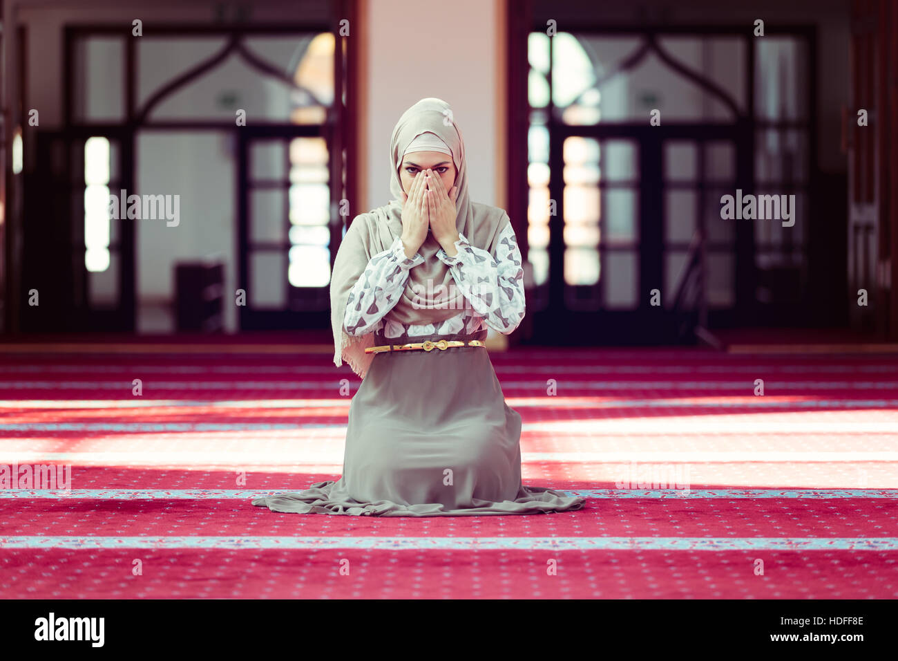 Young beautiful Muslim Woman Praying In Mosque Stock Photo - Alamy