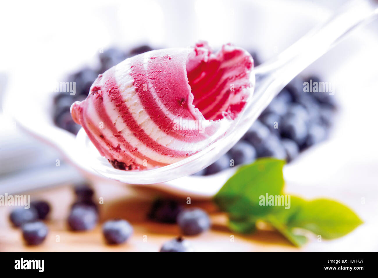 Curl of yoghurt-bilberry ice cream Stock Photo - Alamy