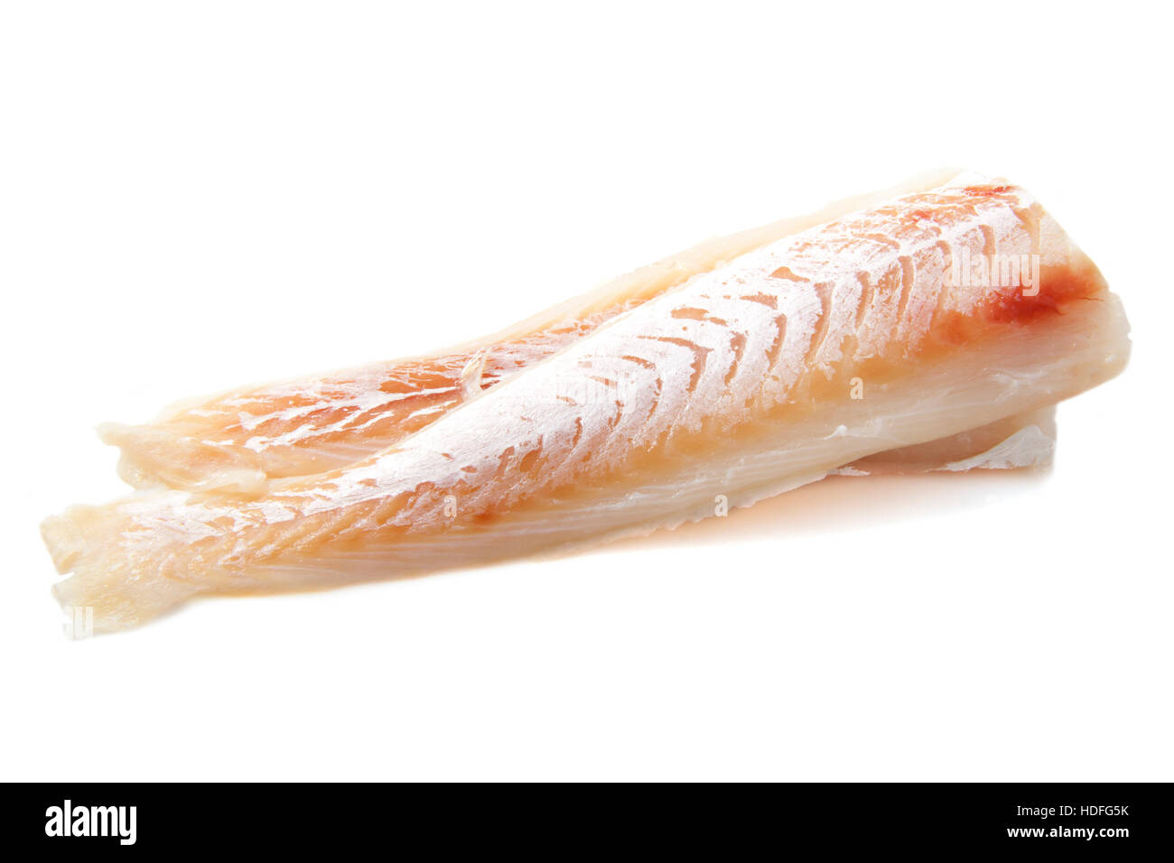 Two alaska cod fillet isolated on a white background Stock Photo - Alamy