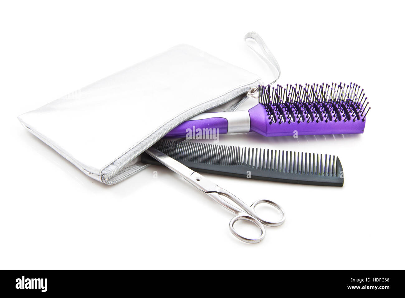 Brush comb and scissors in silver case isolated over white Stock Photo ...