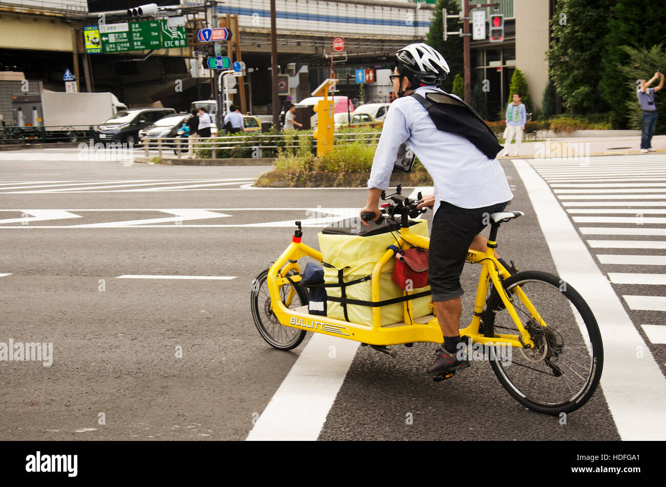 Japanese people riding new innovation bicycle waiting traffic sign for ...