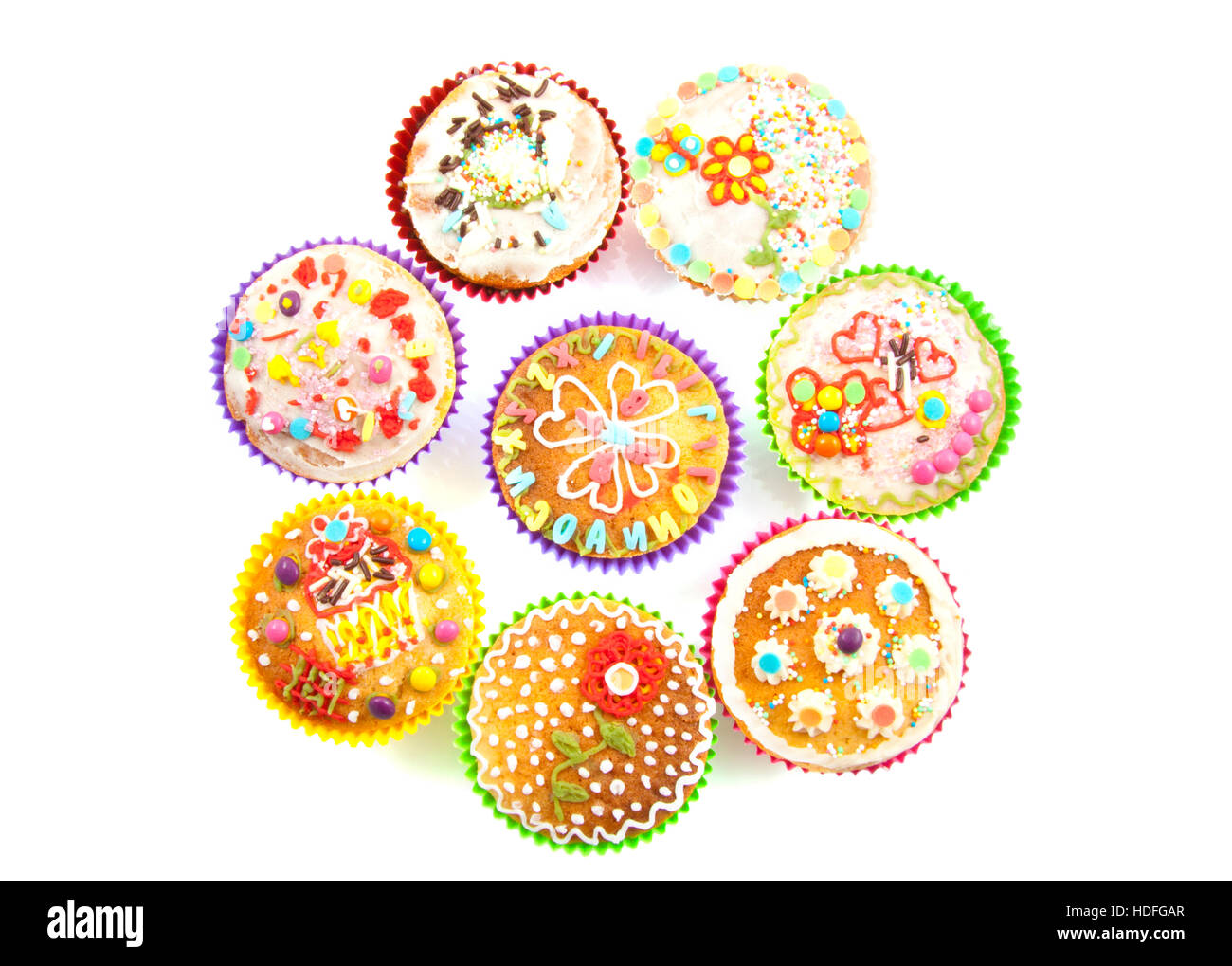 Colorful cupcakes in a circle isolated over white Stock Photo - Alamy
