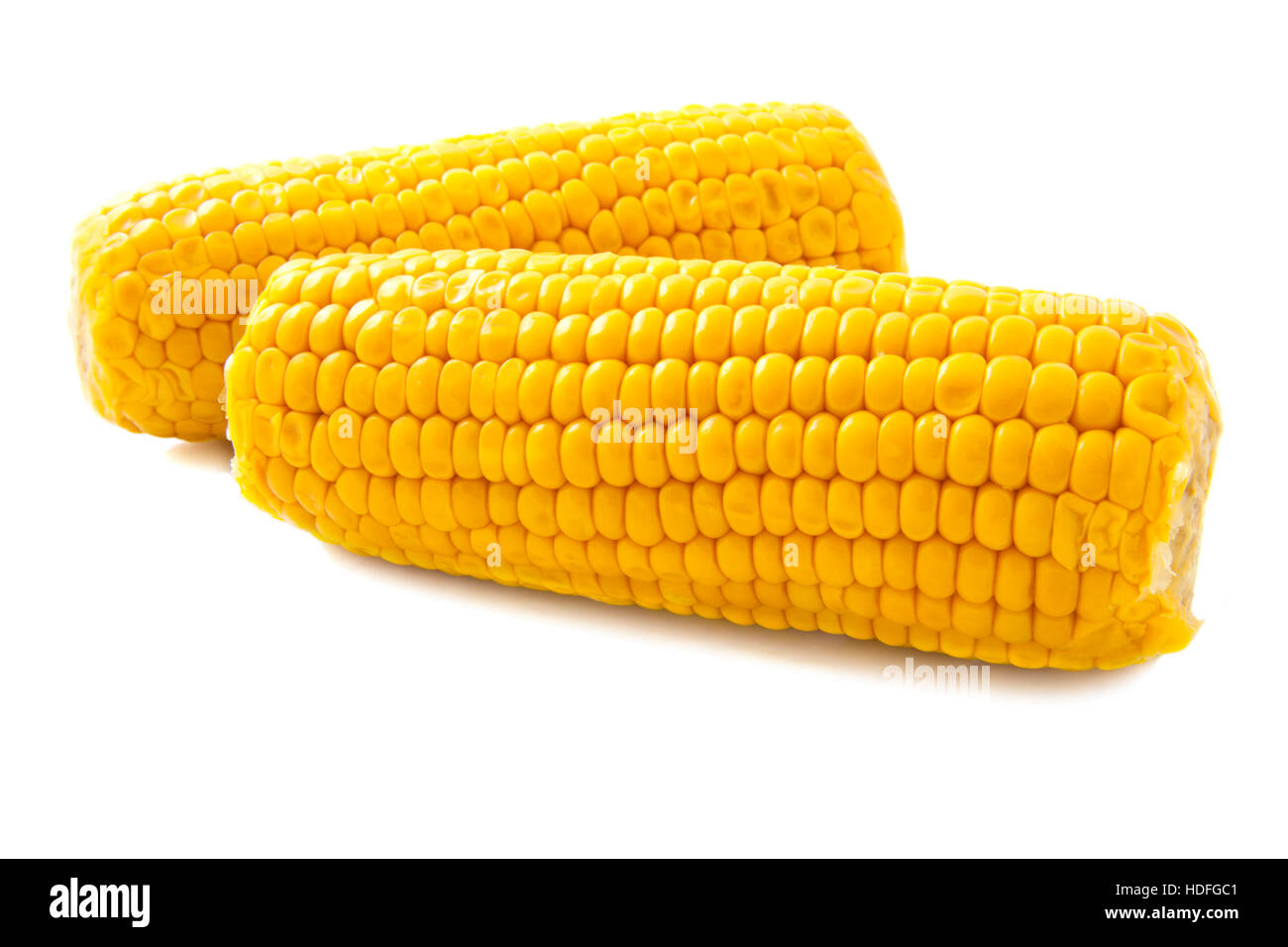 Yellow golden corn isolated on a white background Stock Photo - Alamy