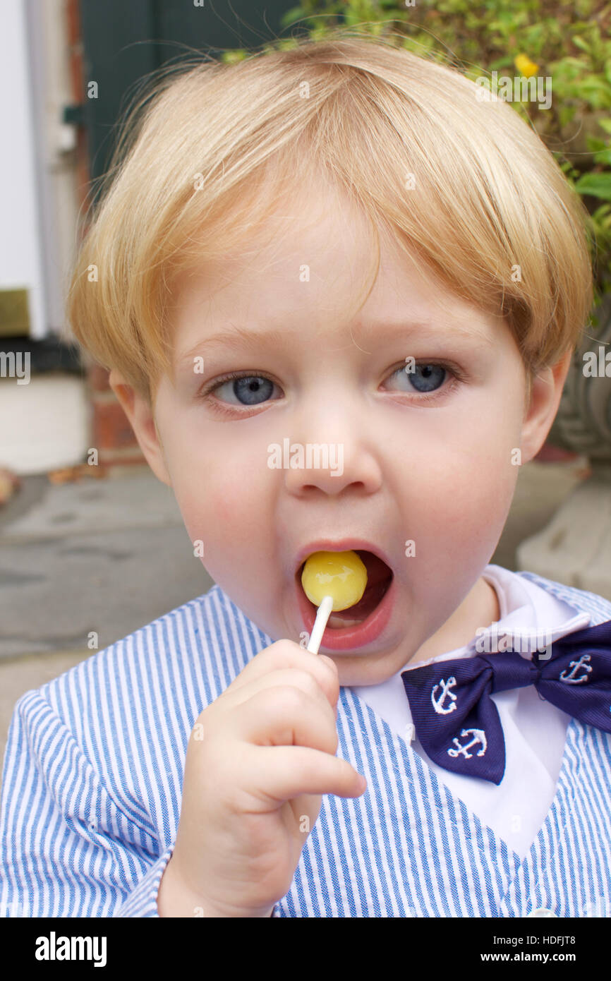 Boy wearing bow tie hi-res stock photography and images - Alamy