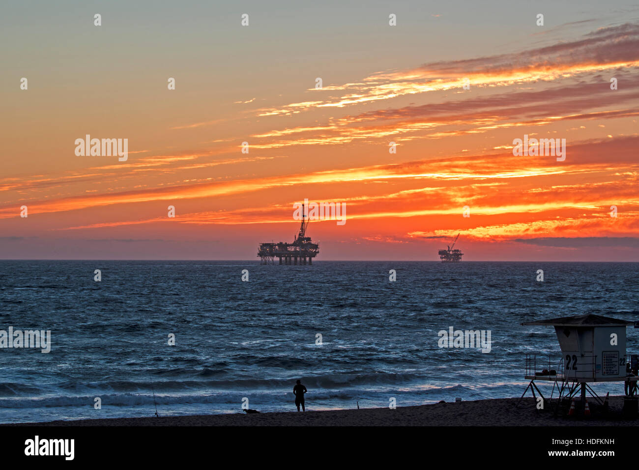 Beach oil rig platform at sunset off California coast Stock Photo - Alamy