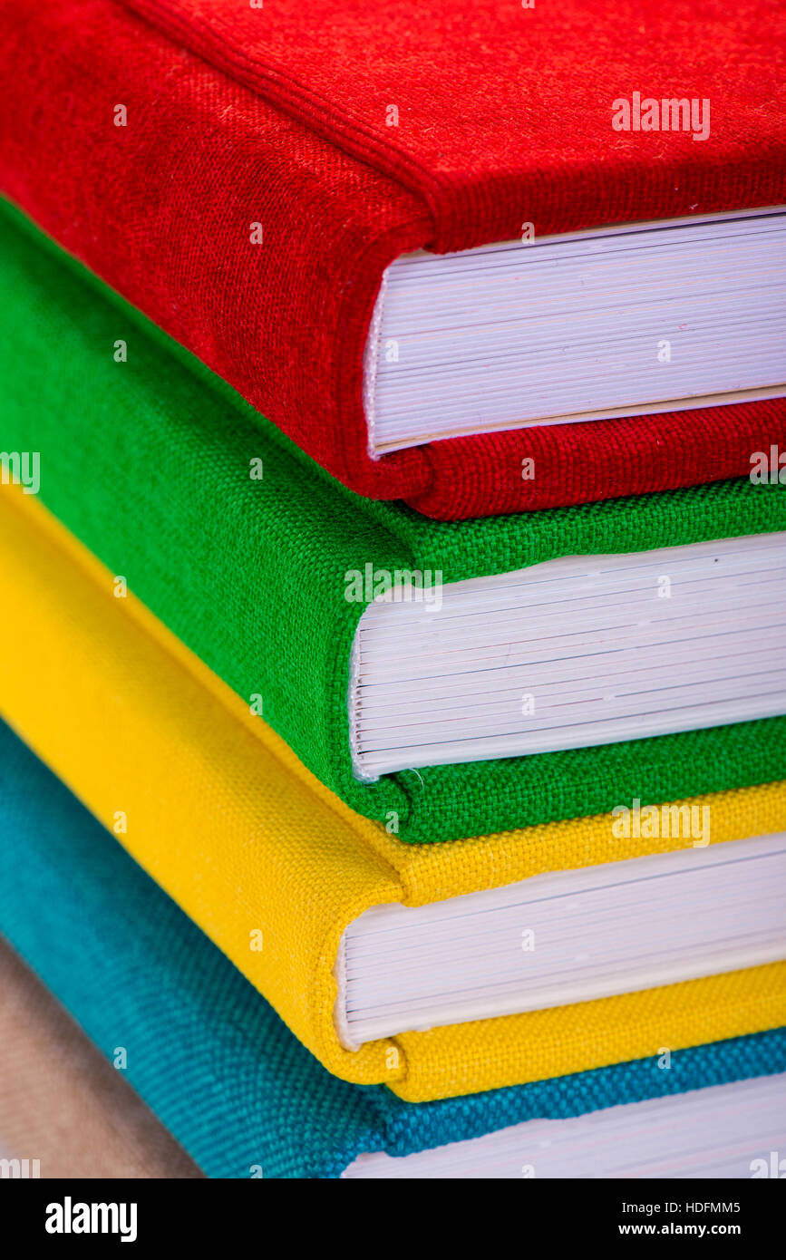 Multicolored book textile cover. Photobooks on a white background Stock ...