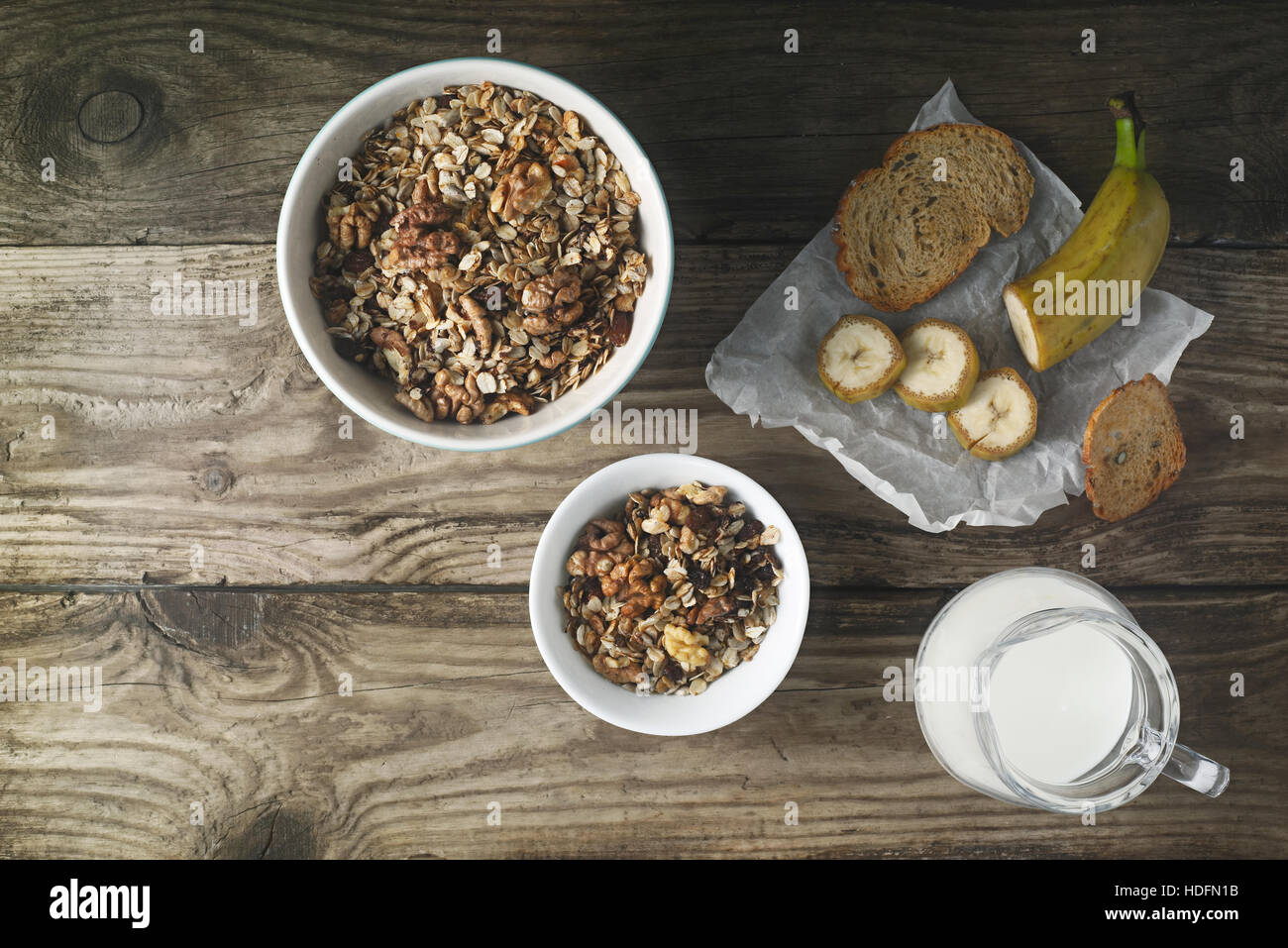 Breakfast with granola on the wooden table horizontal Stock Photo - Alamy