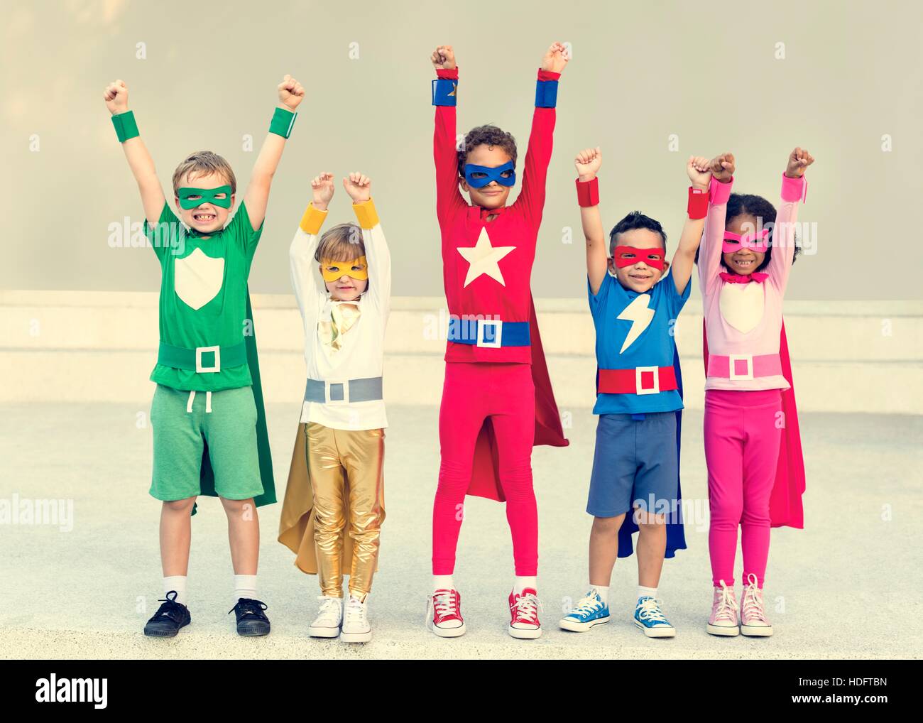Superheroes Cheerful Kids Expressing Positivity Concept Stock Photo - Alamy