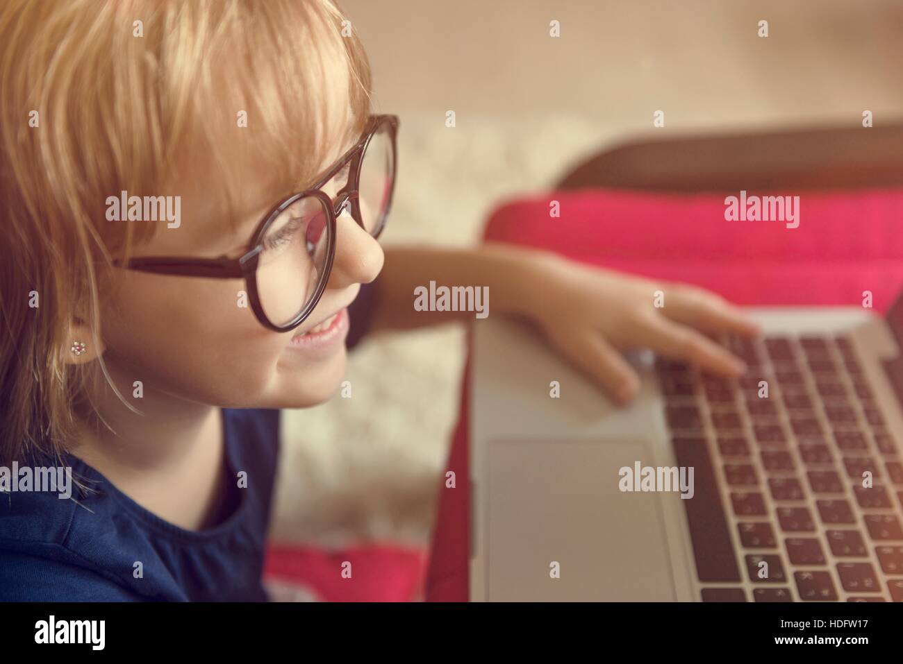 Little Girl Using Device Concept Stock Photo - Alamy