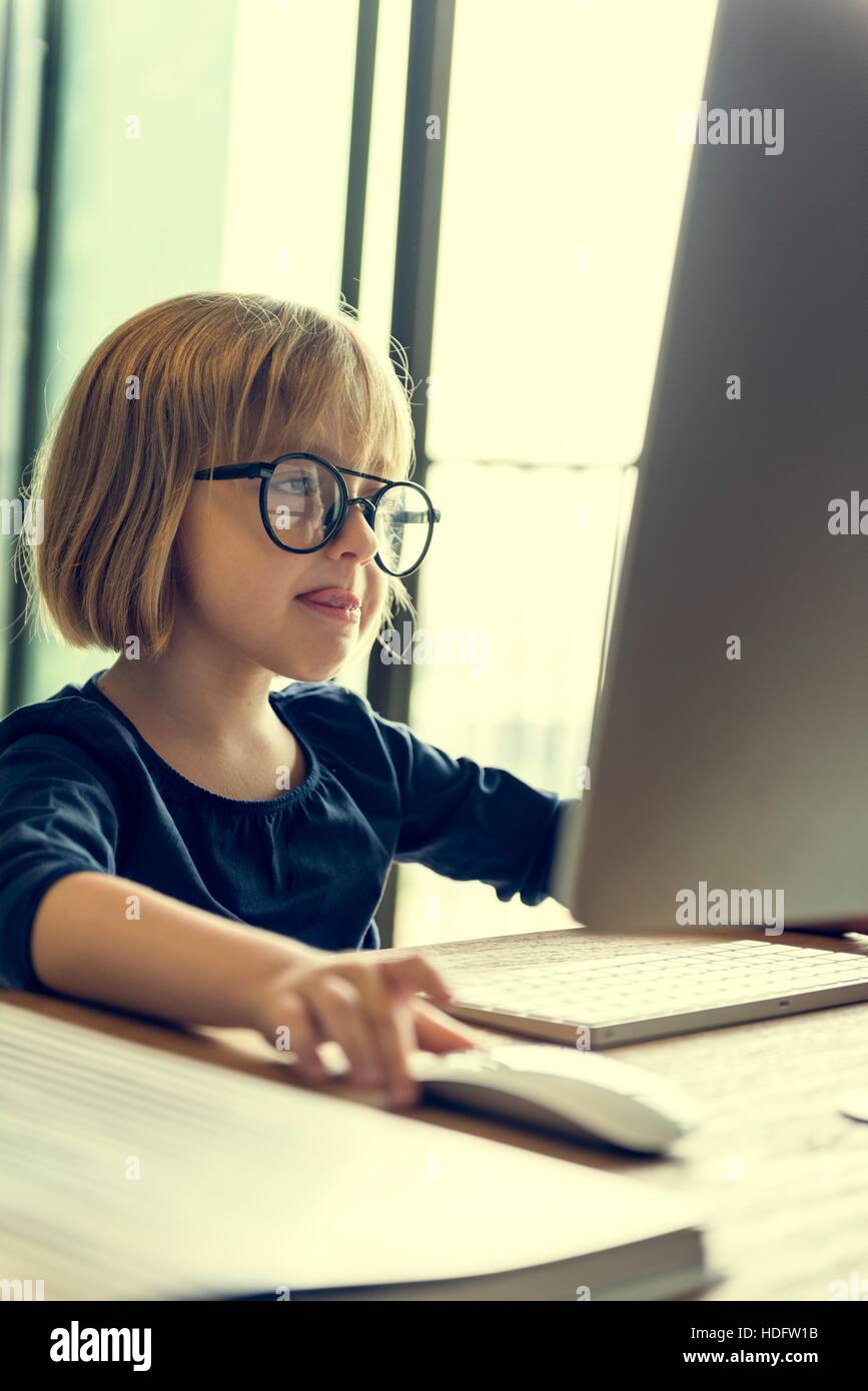 Little Girl Using Computer Concept Stock Photo - Alamy