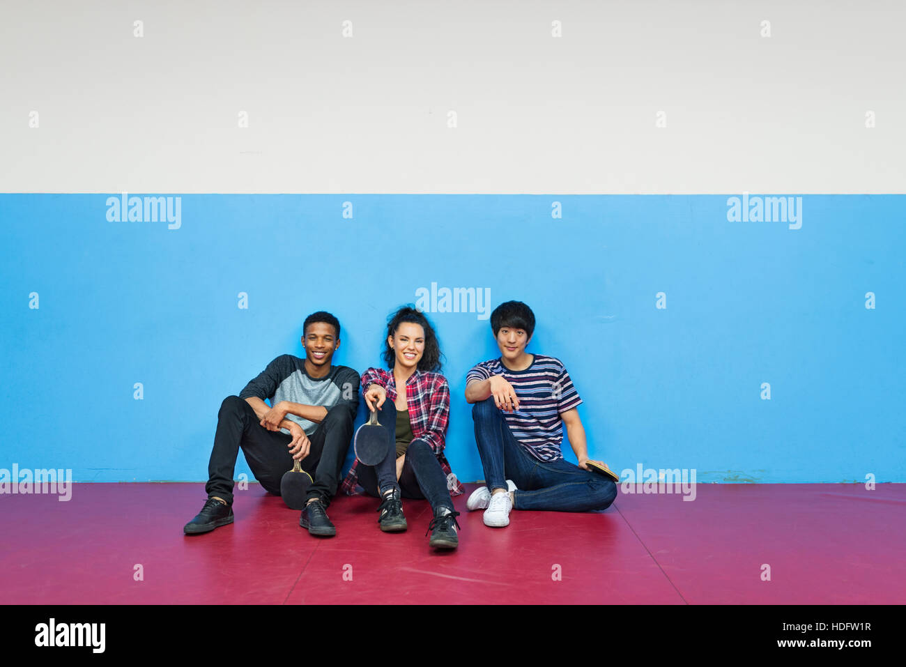 Diverse friends playing tennis hi-res stock photography and images - Alamy