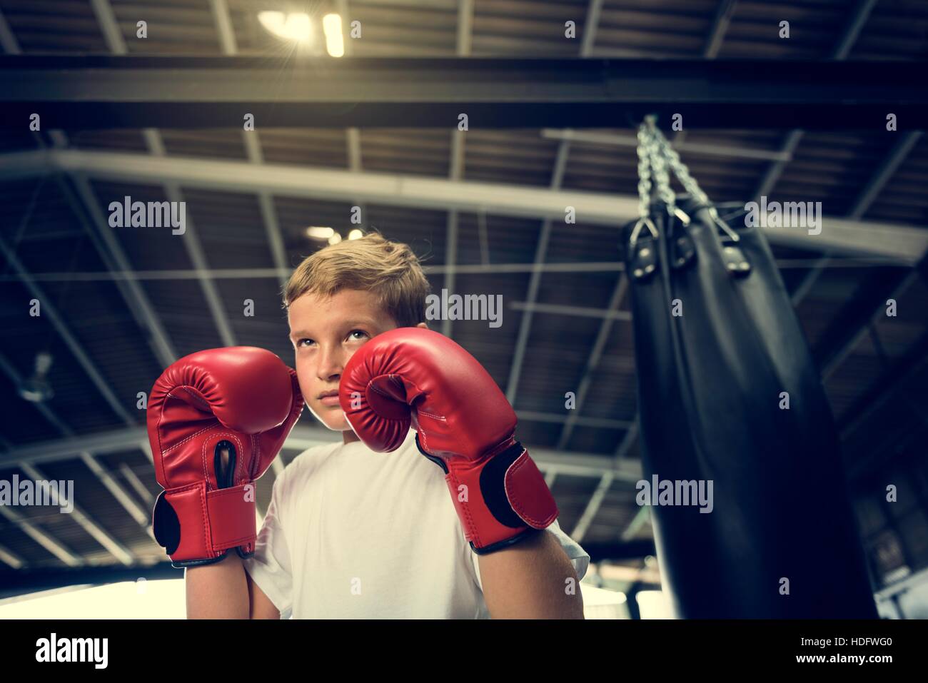 Boy Boxing Training Punching Bag Exercise Concept Stock Photo - Alamy