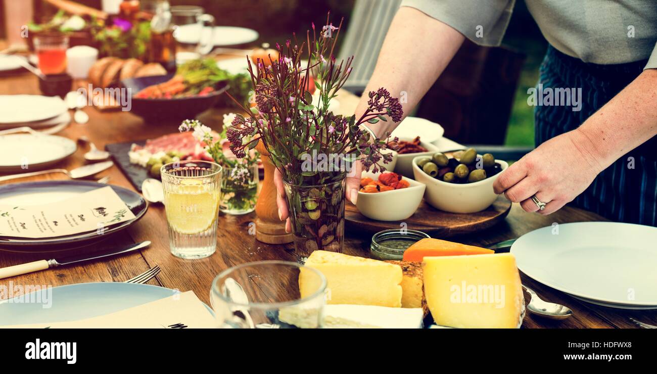 Woman Preparing Table Dinner Concept Stock Photo - Alamy