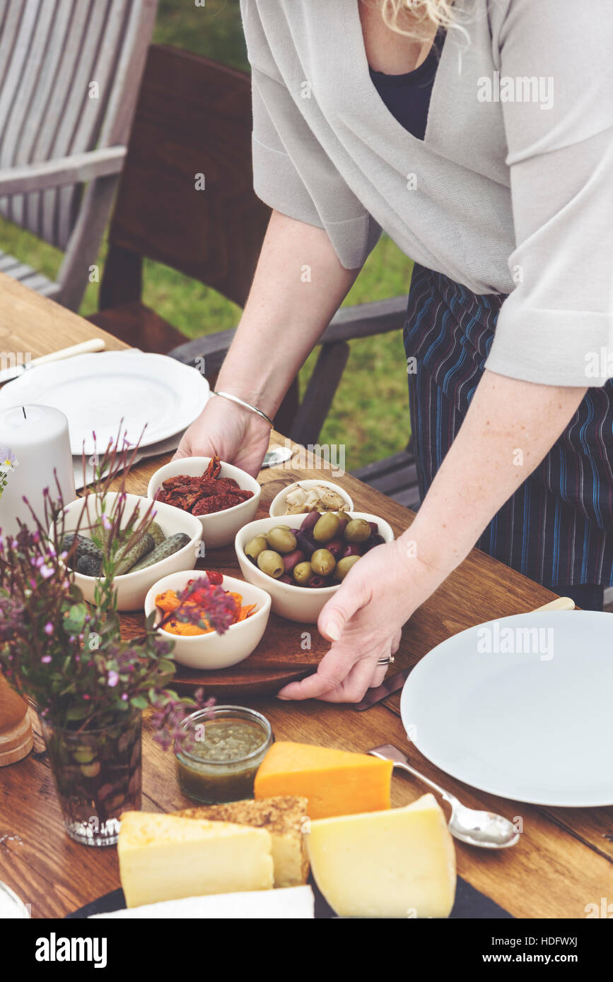 Woman Preparing Table Dinner Concept Stock Photo - Alamy