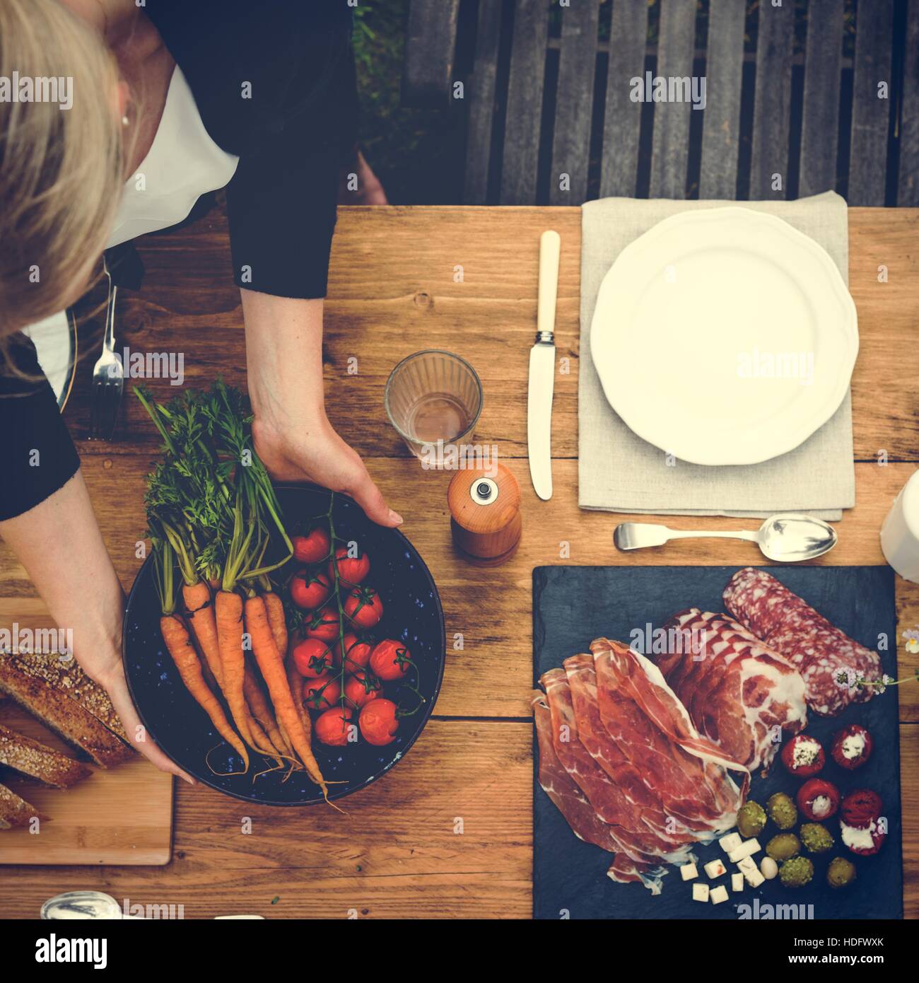 Woman Preparing Table Dinner Concept Stock Photo - Alamy