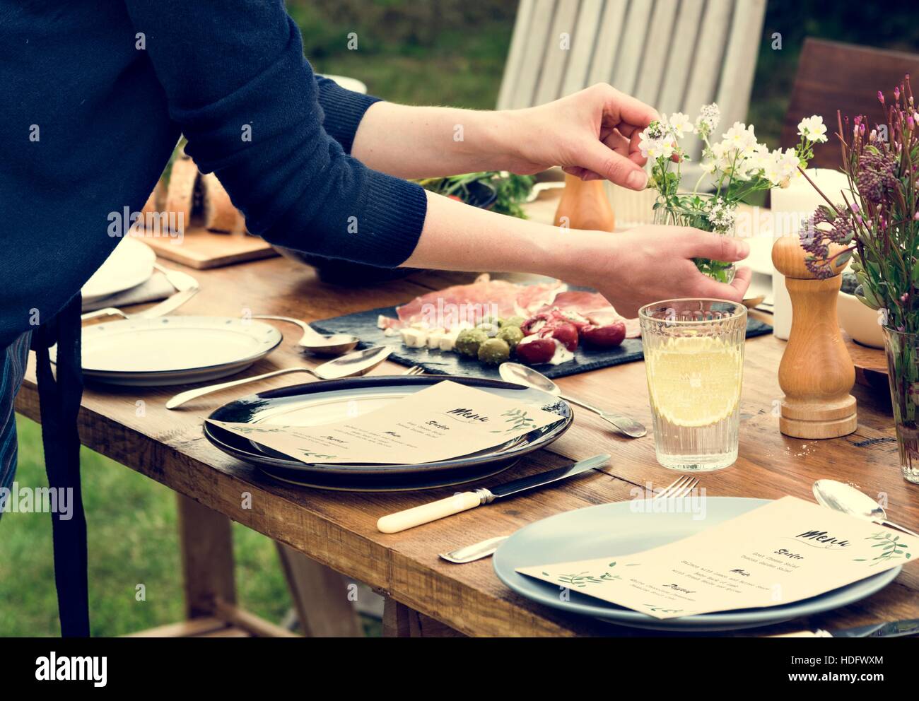 Woman Preparing Table Dinner Concept Stock Photo - Alamy
