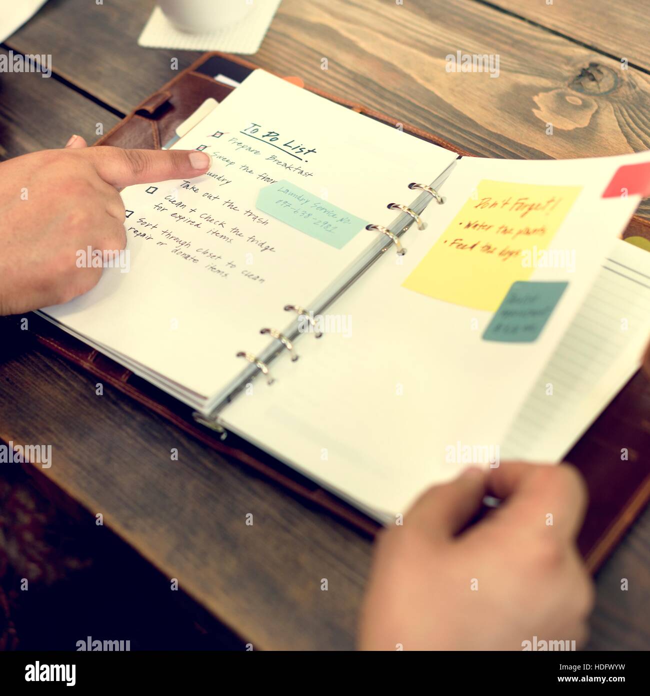 Indian Couple Checking To Do List Concept Stock Photo - Alamy