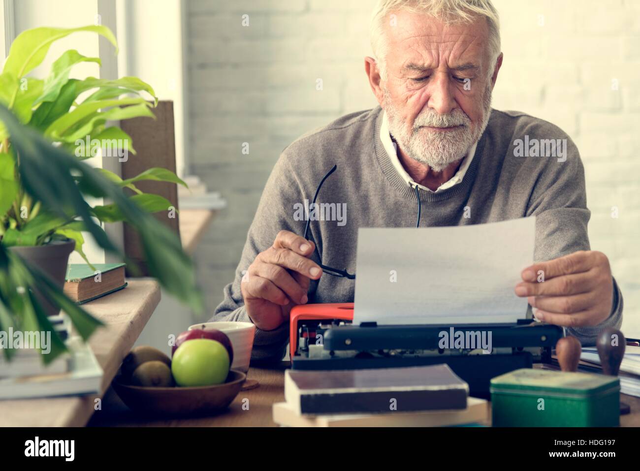 Senior Adult Typing Typerwriter Concept Stock Photo - Alamy