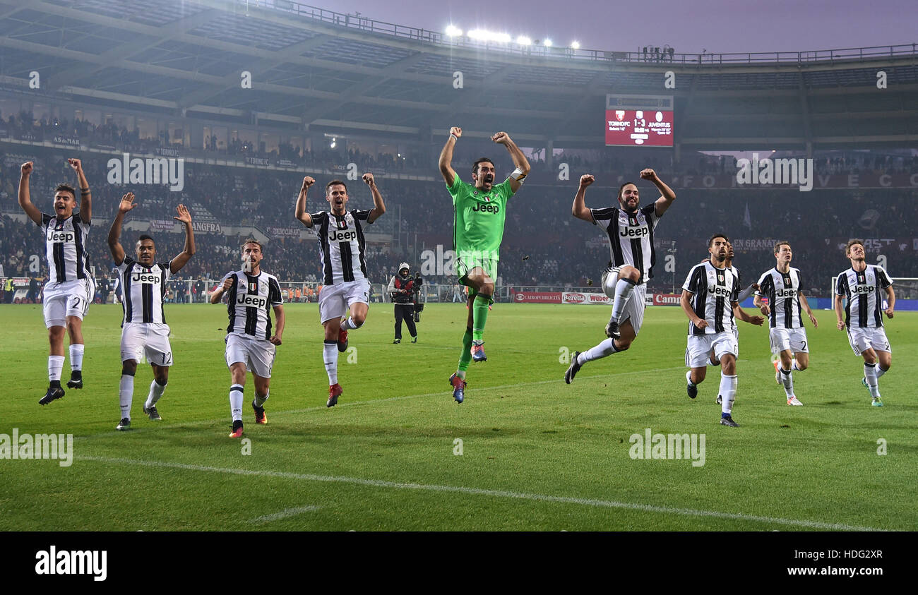 Turin, Italy. 11th Dec, 2016. Players of Juventus celebrate after ...