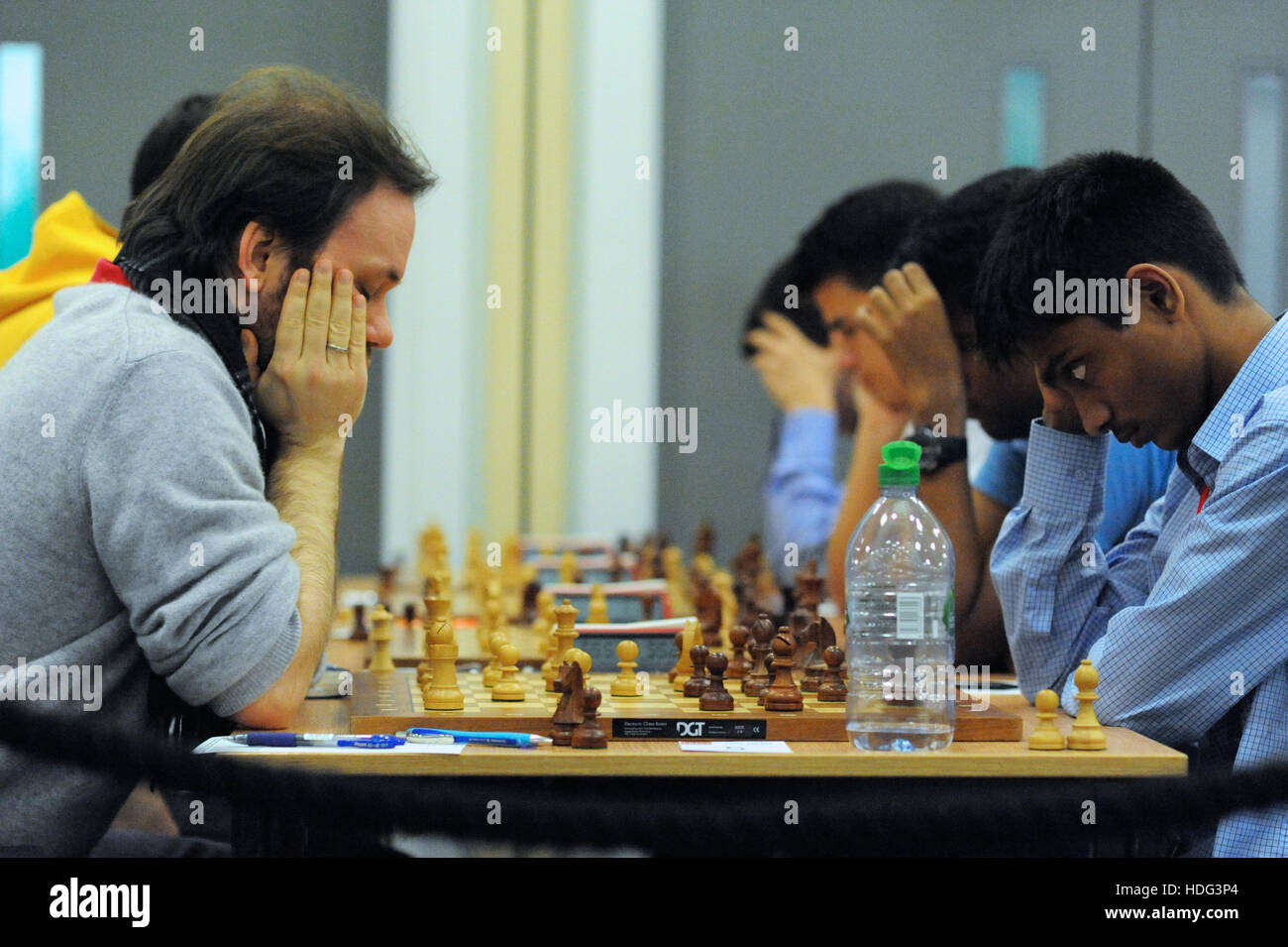 London, UK. 11th Dec, 2016. Two men intensely examining their chess ...