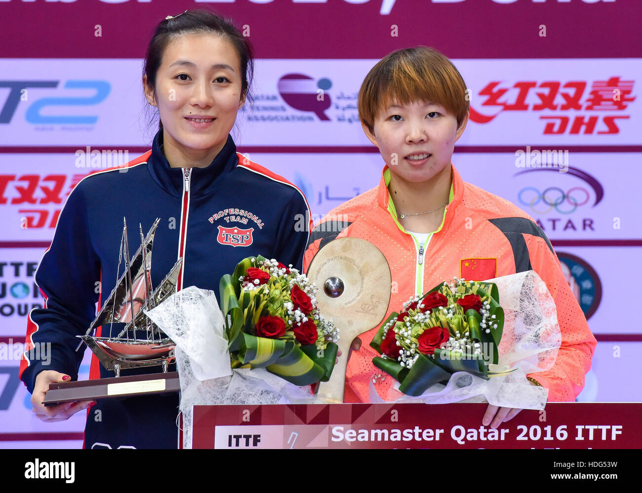 Doha, Qatar. 11th Dec, 2016. Gold medalist Zhu Yuling (R) of China and silver medalist Han Ting ...