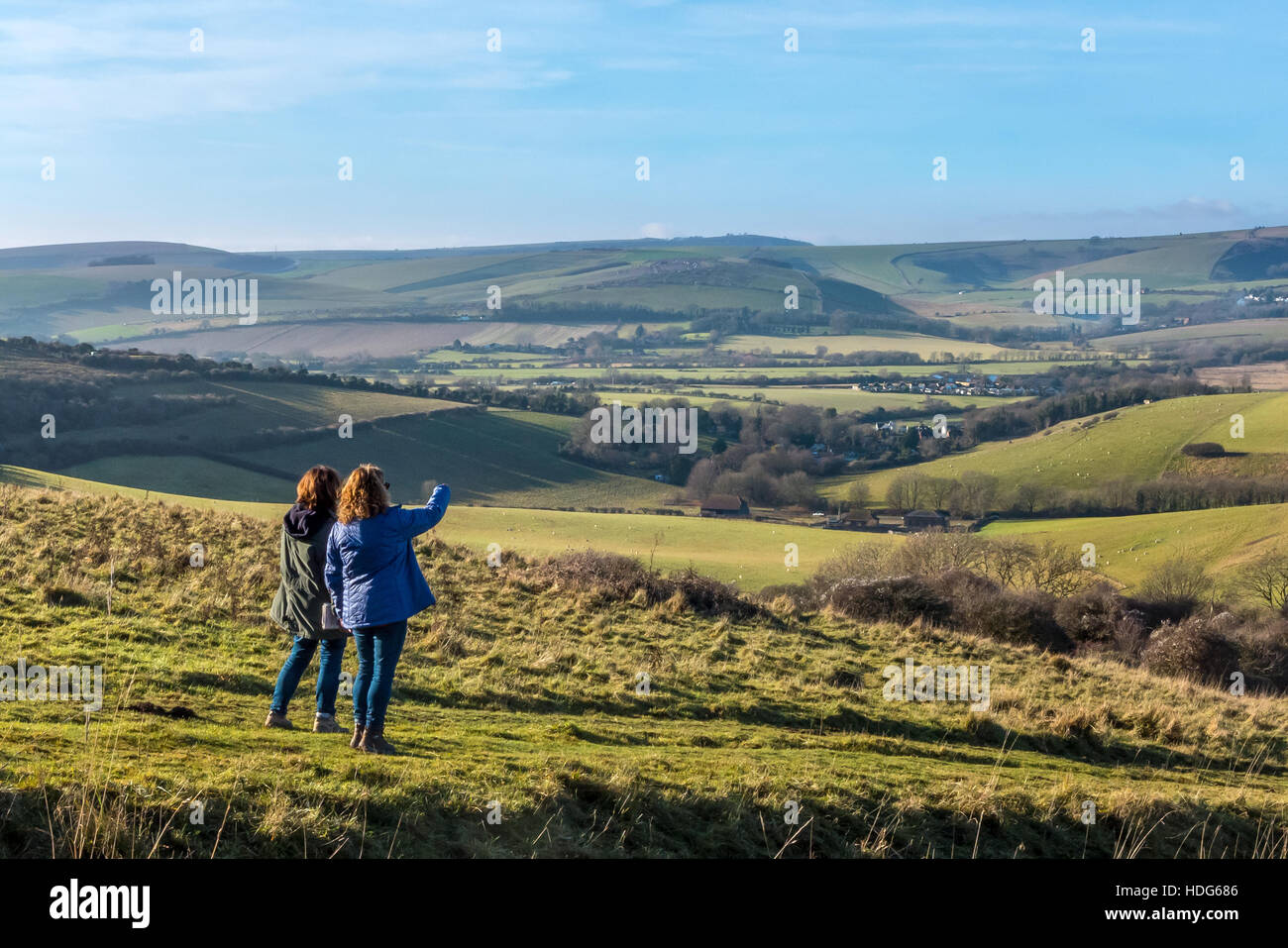Upper Beeding, UK. 11th Dec, 2016. Walkers on the South Downs near ...