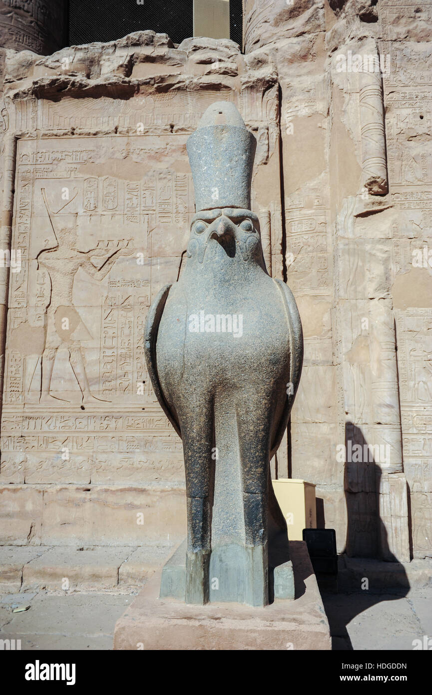 Bird statue in front of the temple of Horus in Edfu Egypt Stock Photo ...