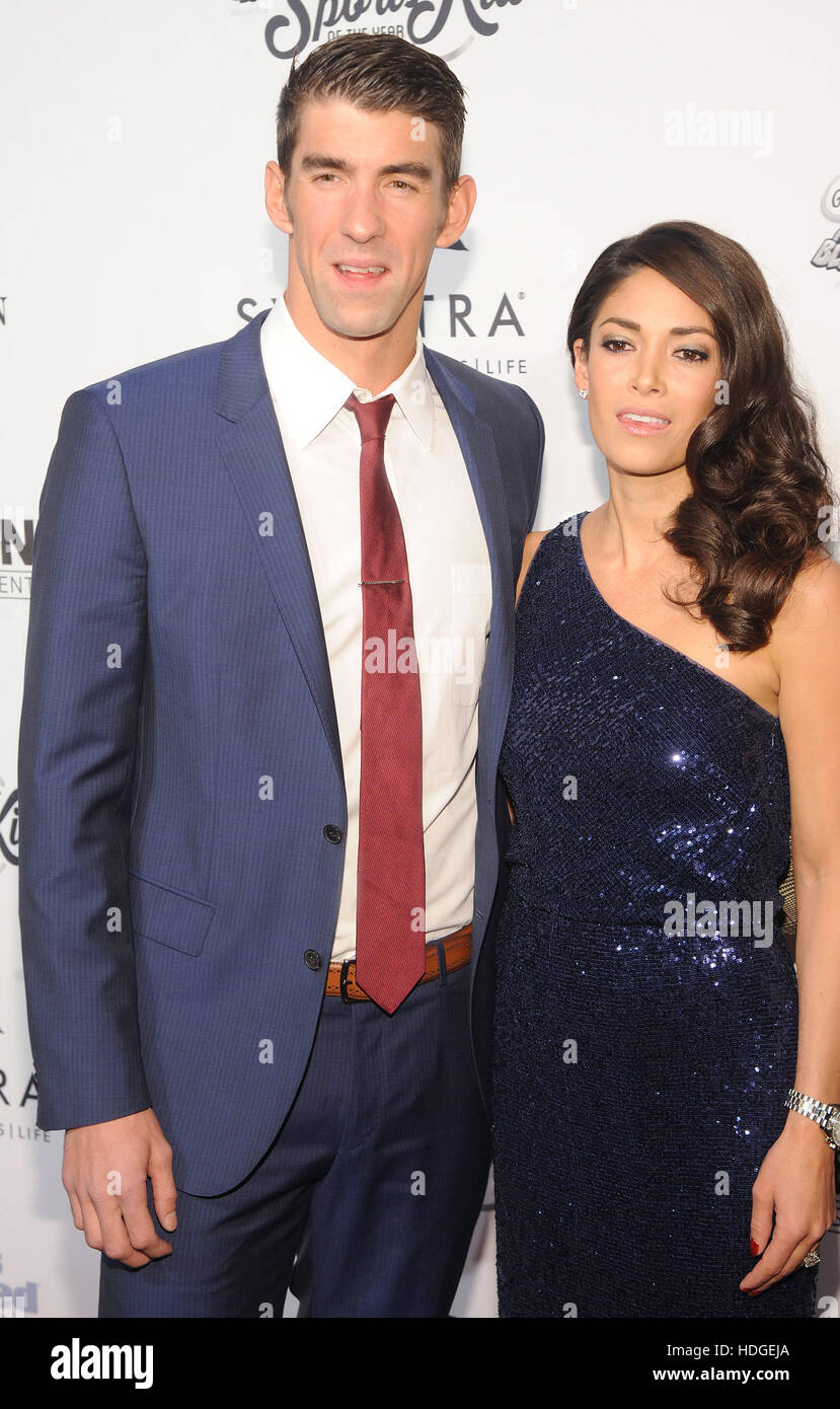 New York, USA. 12th Dec, 2016. Michael Phelps and Nicole Johnson attend ...