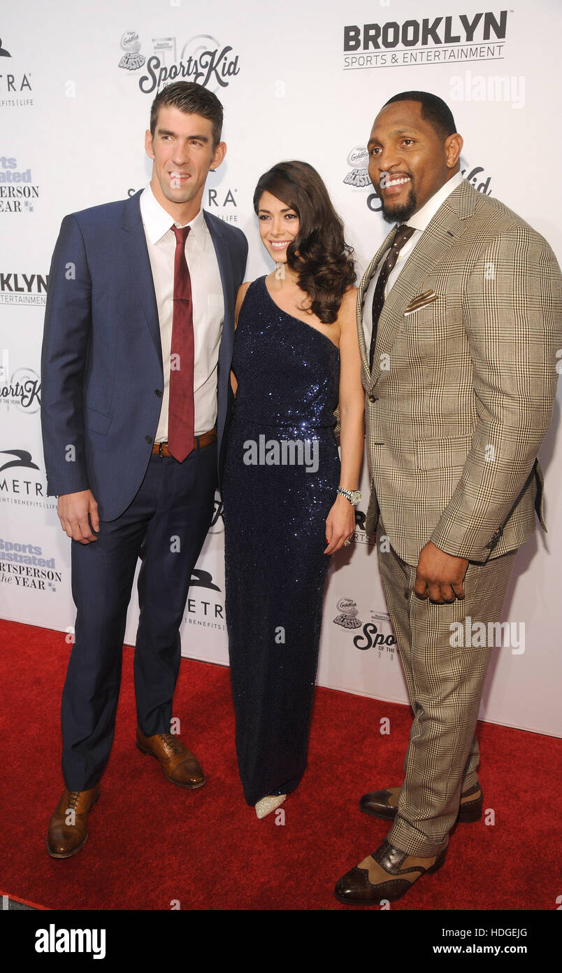 New York, USA. 12th Dec, 2016. Michael Phelps and Nicole Johnson and ...