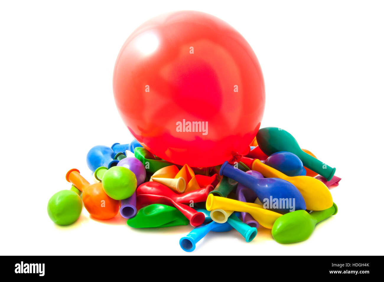 Colorful balloons on a pile over white Stock Photo - Alamy
