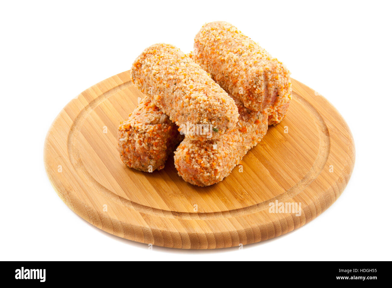 Dutch kroket on a wooden plate isolated over white Stock Photo - Alamy