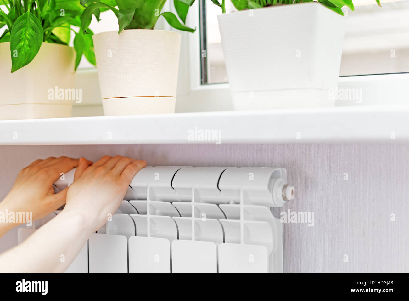 Arm put on heating white hi-res stock photography and images - Alamy