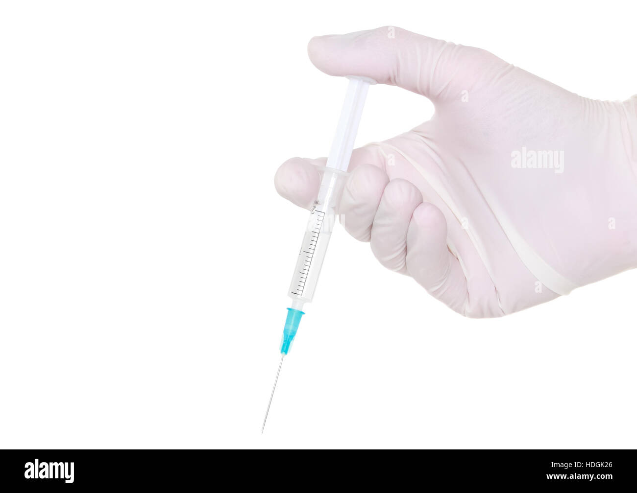 Syringe in a hand in medical gloves, , ready for injection with ...